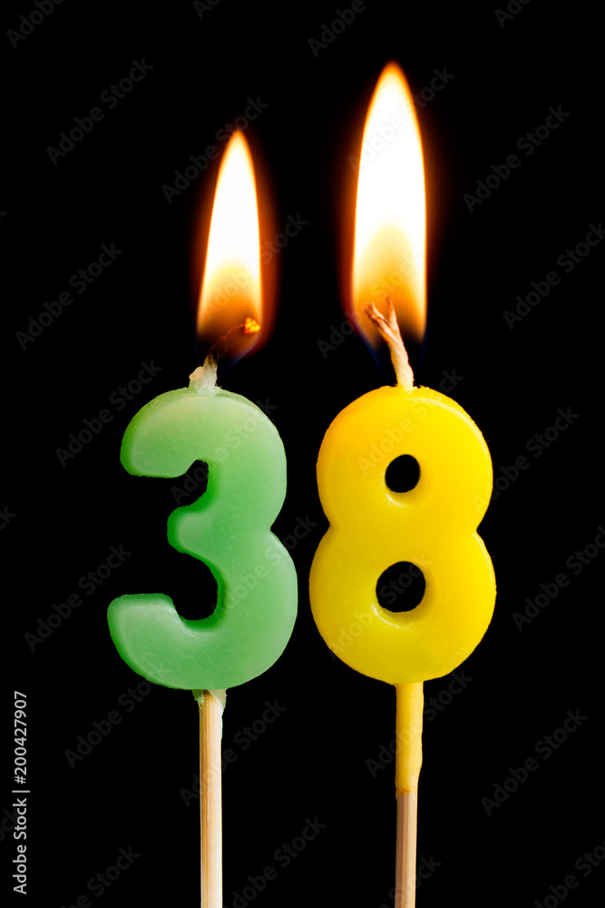 Burning candles in the form of 38 thirty eight (numbers, dates) for ...
