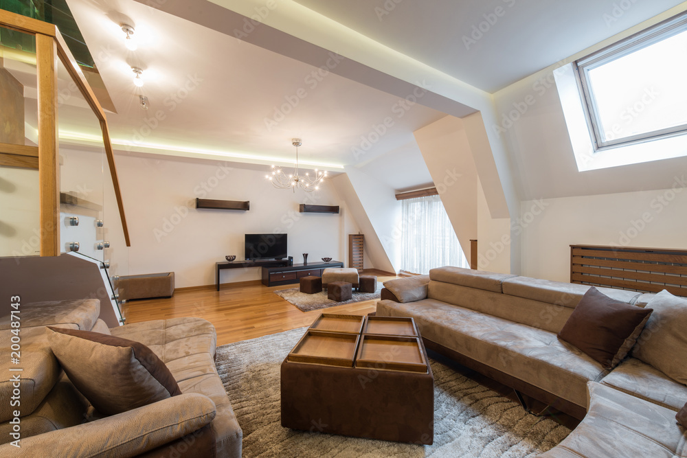 Open plan living room interior in luxury loft apartment with stairs ...