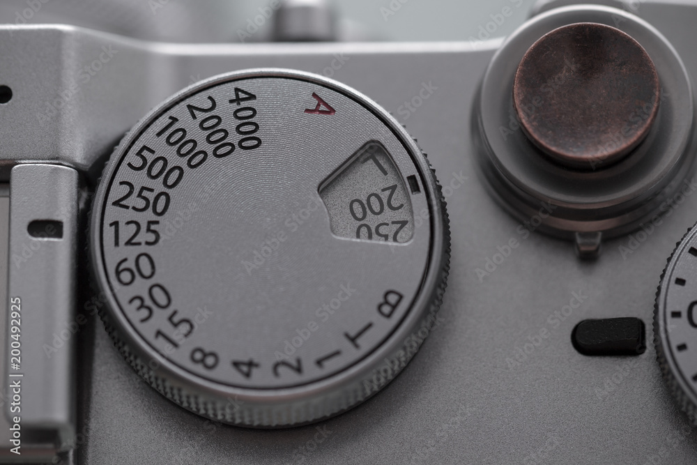 shutter release button and shutter speed dial of vintage camera ...