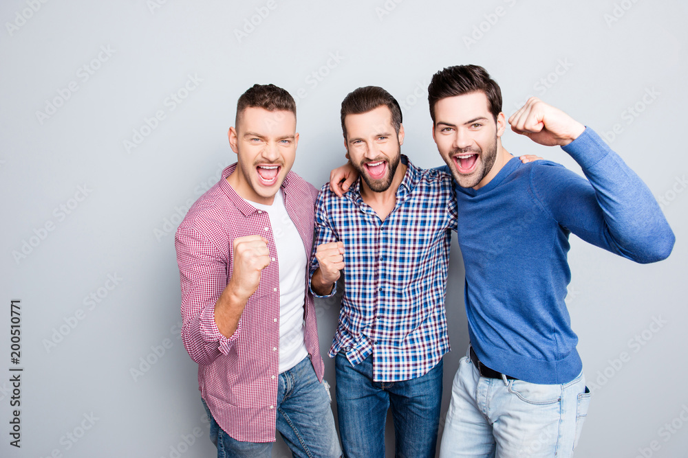 Portrait of cheerful, crazy, virile, harsh, funny guys in jeans, denim ...