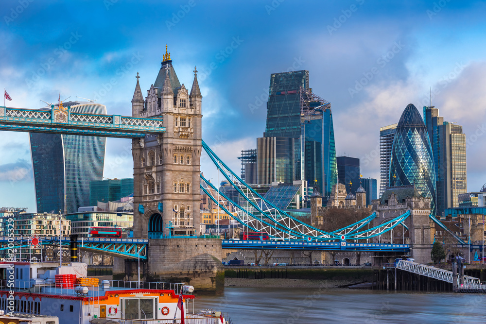 London, England - The famous Tower Bridge with iconic red double-decker ...