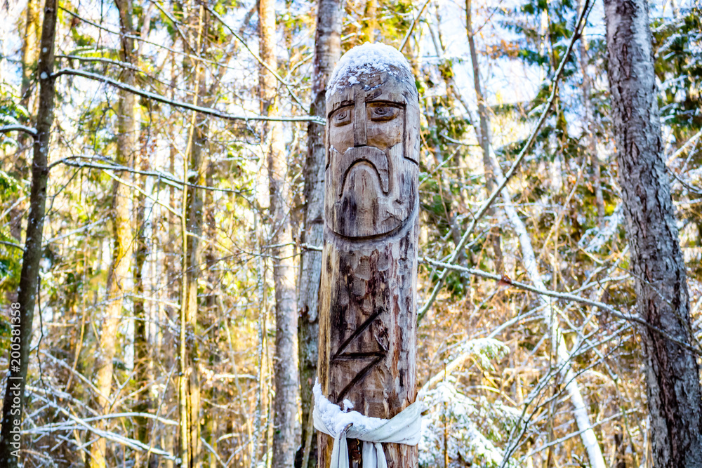 Slavic pagan idols on the forest temple. Perun Stock Photo | Adobe Stock