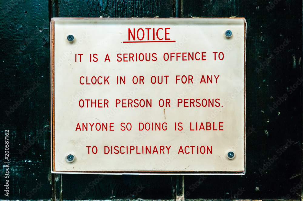 Sign warning that it is an offence to clock in our out for anyone else ...