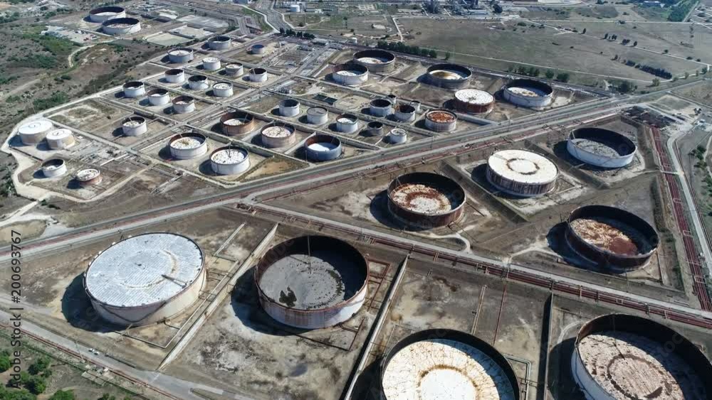 Aerial of empty oil depots sometimes called tank farm installation or ...