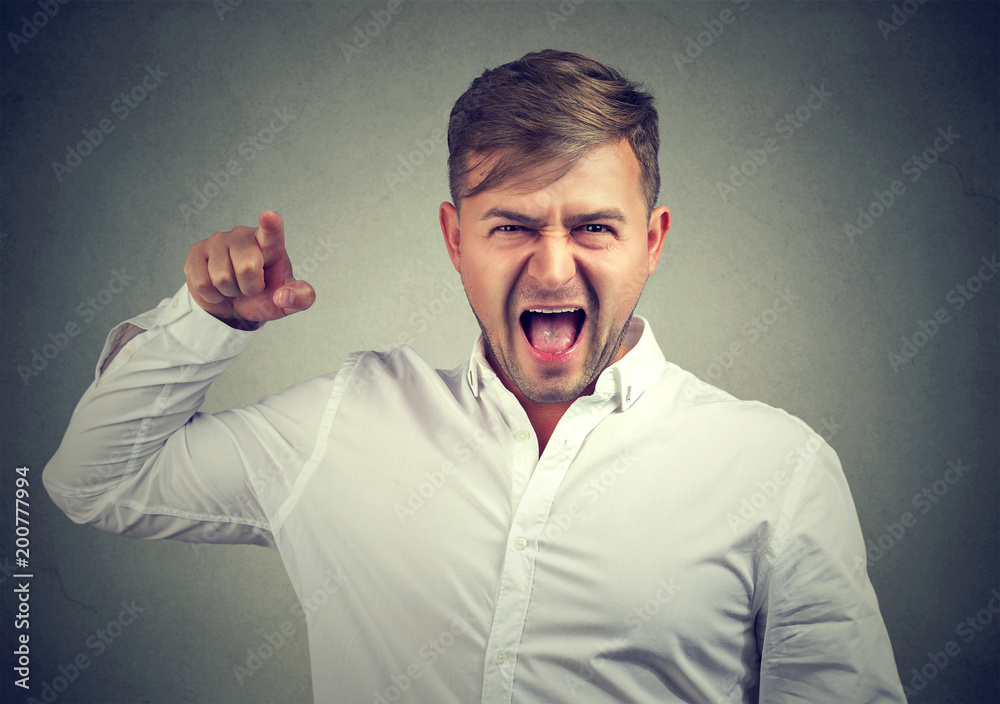 Angry man pointing at camera in blame Stock Photo | Adobe Stock