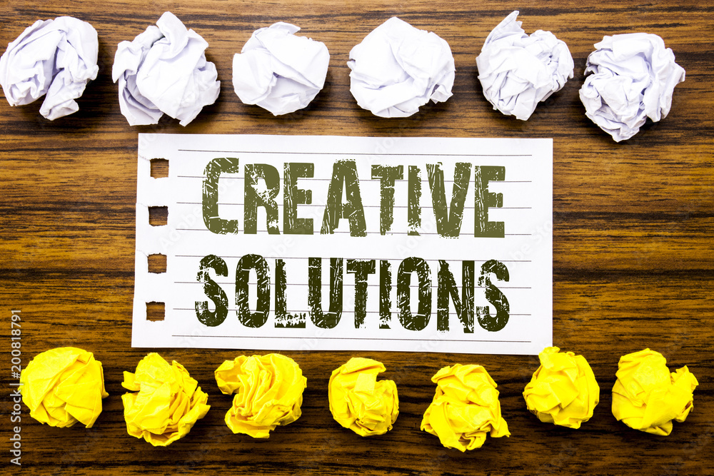 Handwritten text showing Creative Solutions. Business concept for ...