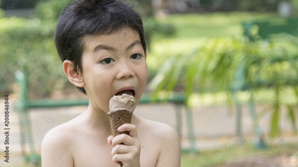 kid boy eat ice cream in close up face feeling delicious Stock Photo ...