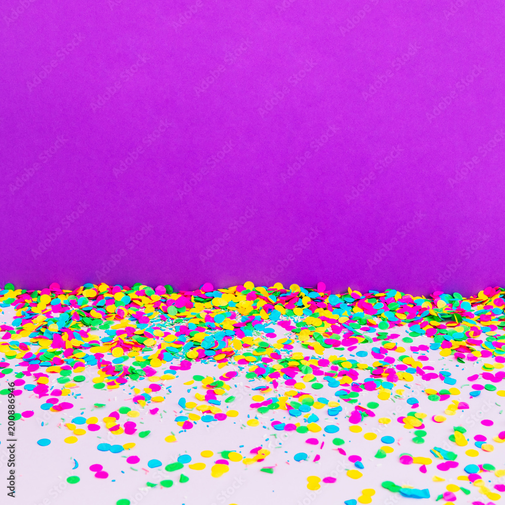 Party pink and purple background with confetti and mock up space for ...