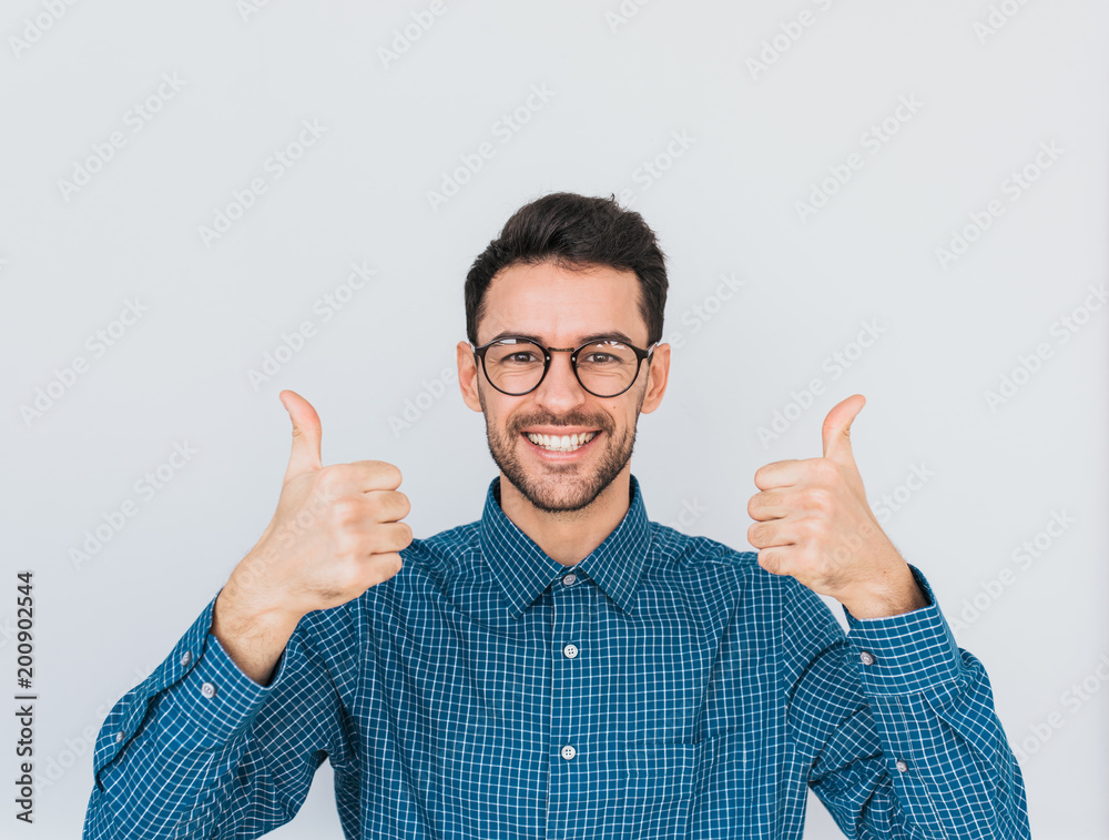 Handsome Male With Healthy Toothy Healthy Smile Wears Round Trendy