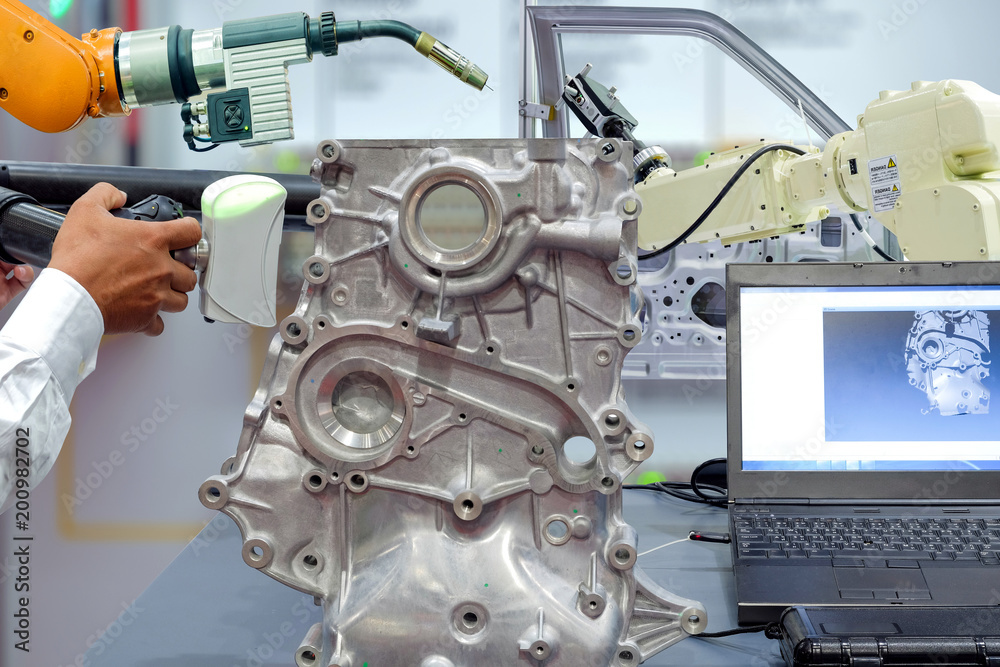 Close-up a hands of technician and robotic use 3D scan for scan part of ...