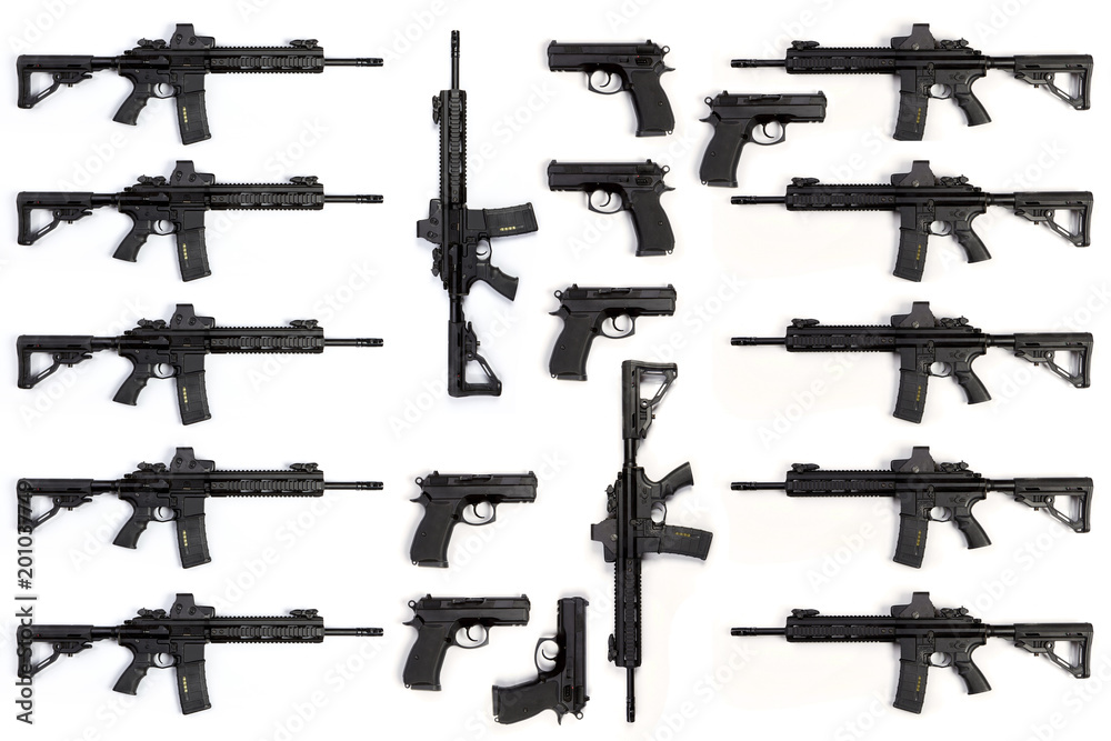 Collection of assault rifles and pistols isolated on white background ...