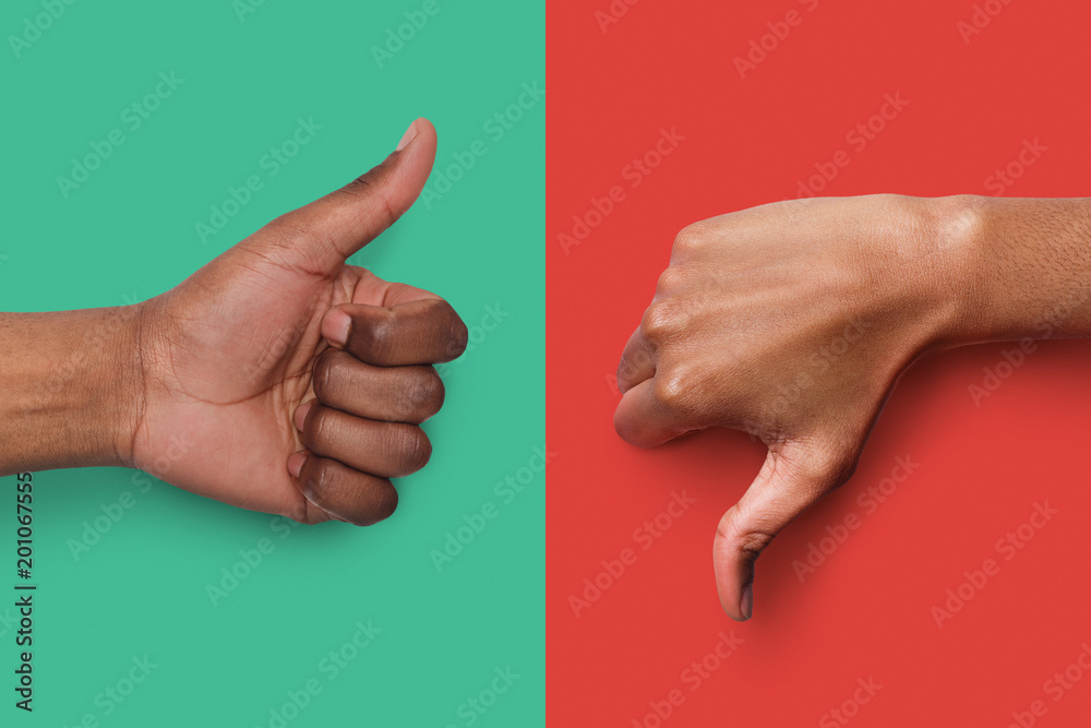 Black hands with thumb up and down gestures Stock Photo | Adobe Stock
