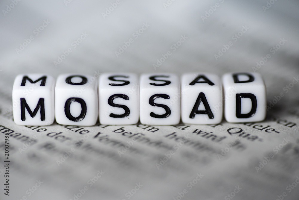 Word MOSSAD formed by wood alphabet blocks on newspaper Stock Photo ...
