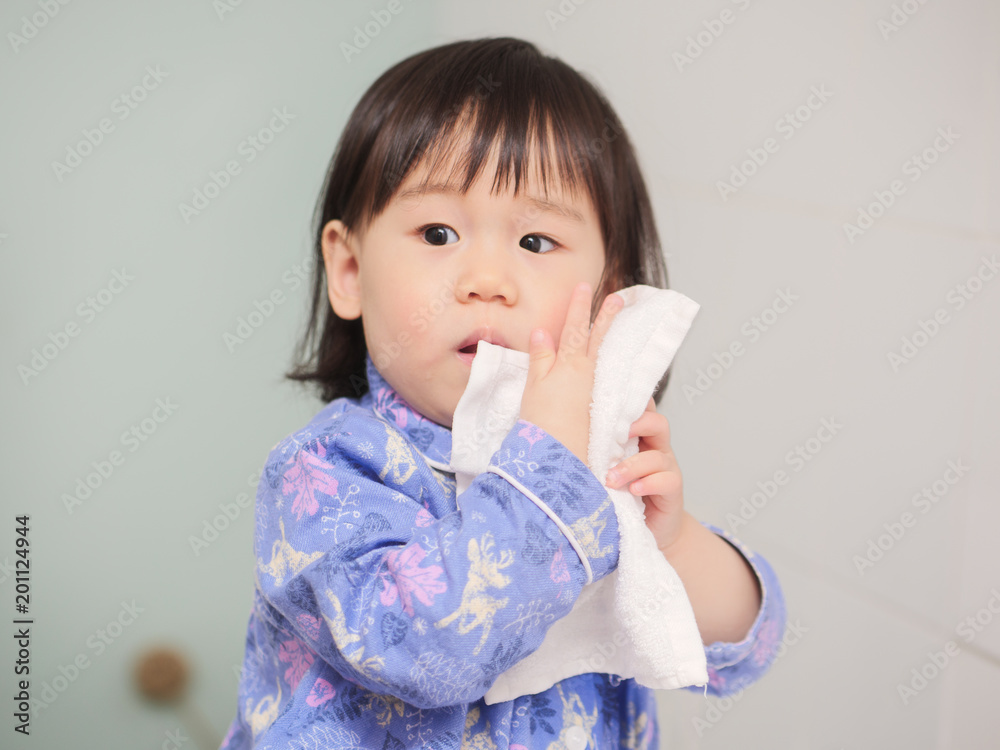 baby girl washing face by herself Stock Photo | Adobe Stock