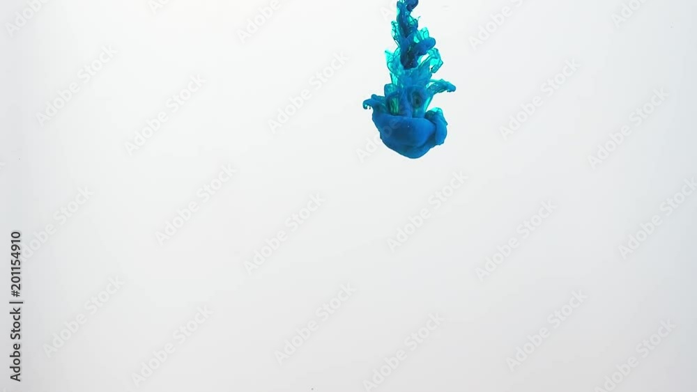 Color ink moving in water on white background. Acrylic ink swirling in ...