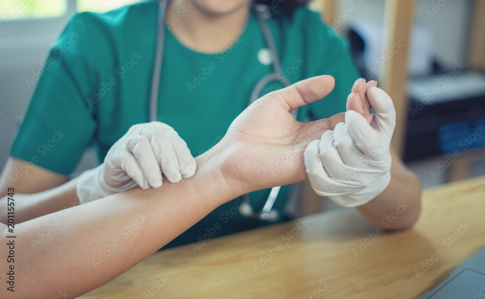 Doctor hand Physicist physical therapy treatment patient in the clinic ...