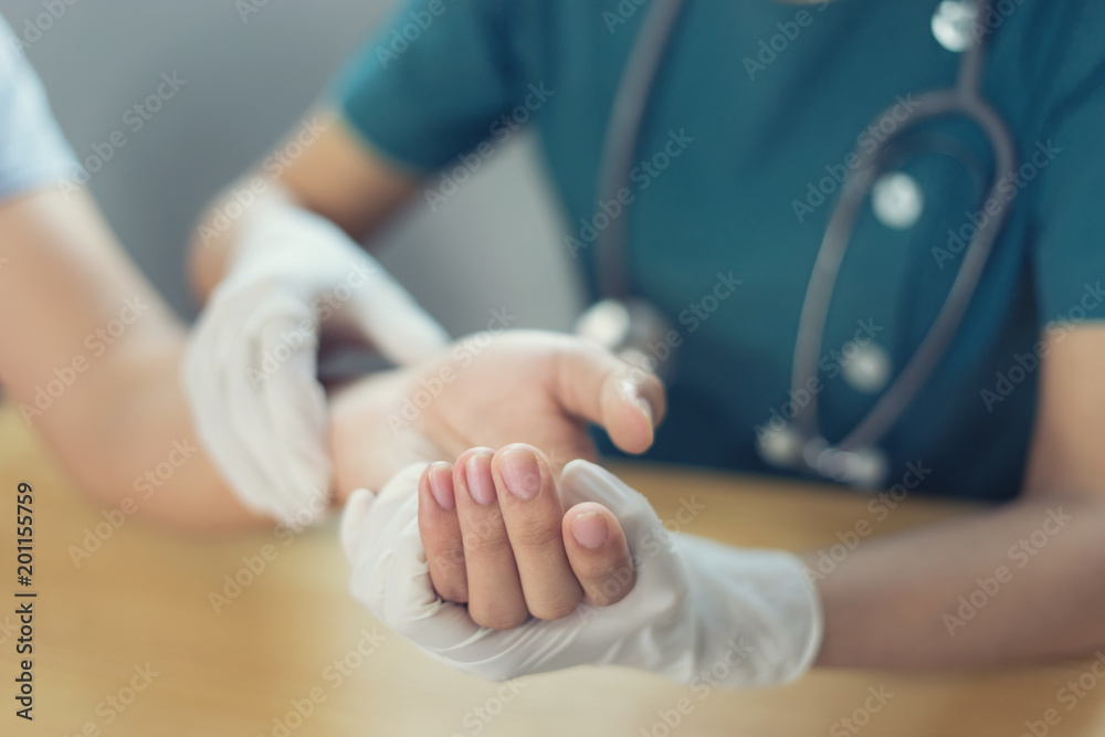 Doctor hand Physicist physical therapy treatment patient in the clinic ...