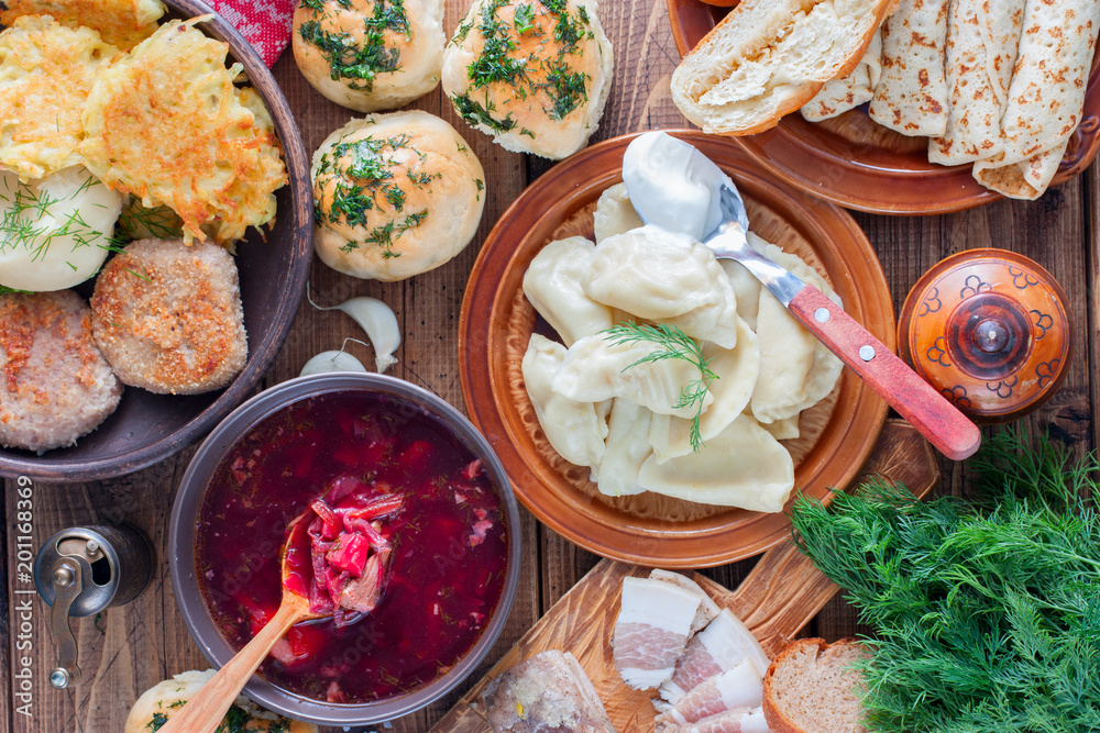 Covered table with traditional Ukrainian food, top view, horizontal ...