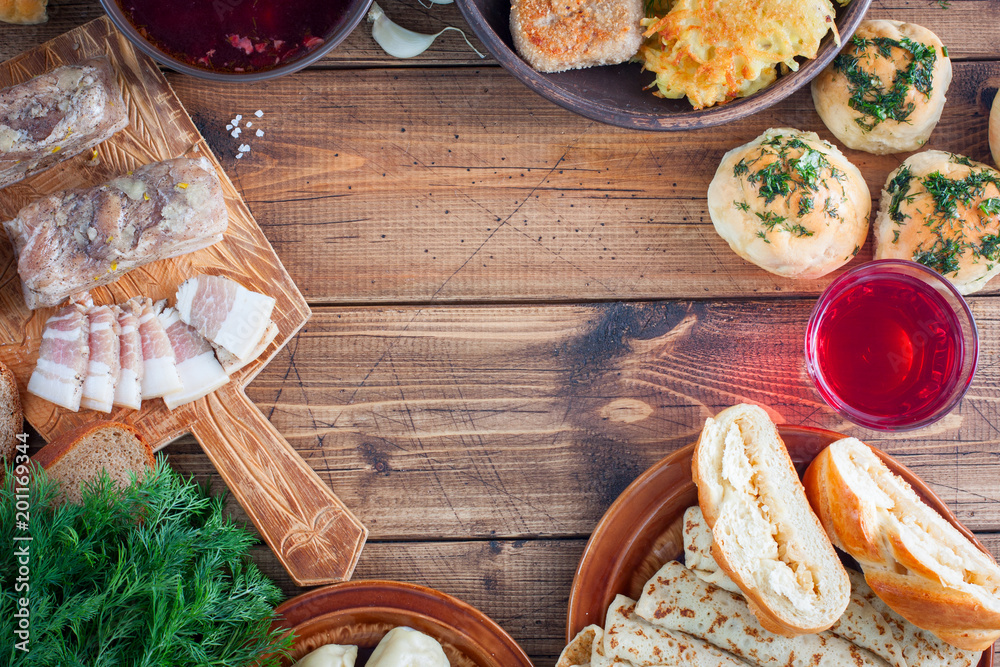 Traditional dishes in Ukrainian cuisine on a wooden table - borsch ...