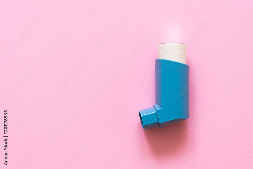 Aerosol for inhalation for the treatment of bronchial asthma on a pink ...