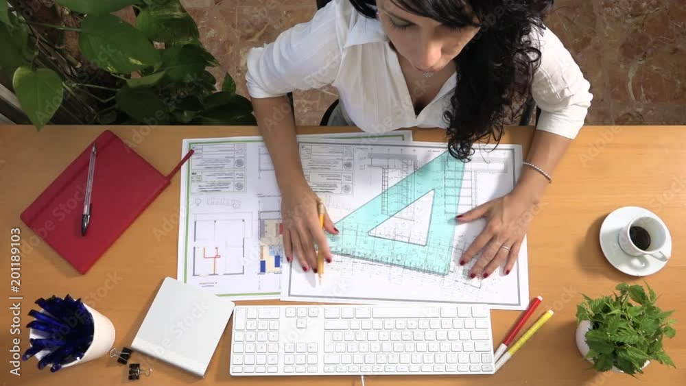 Tired female designer snorting bored and drinking coffee non stop ...