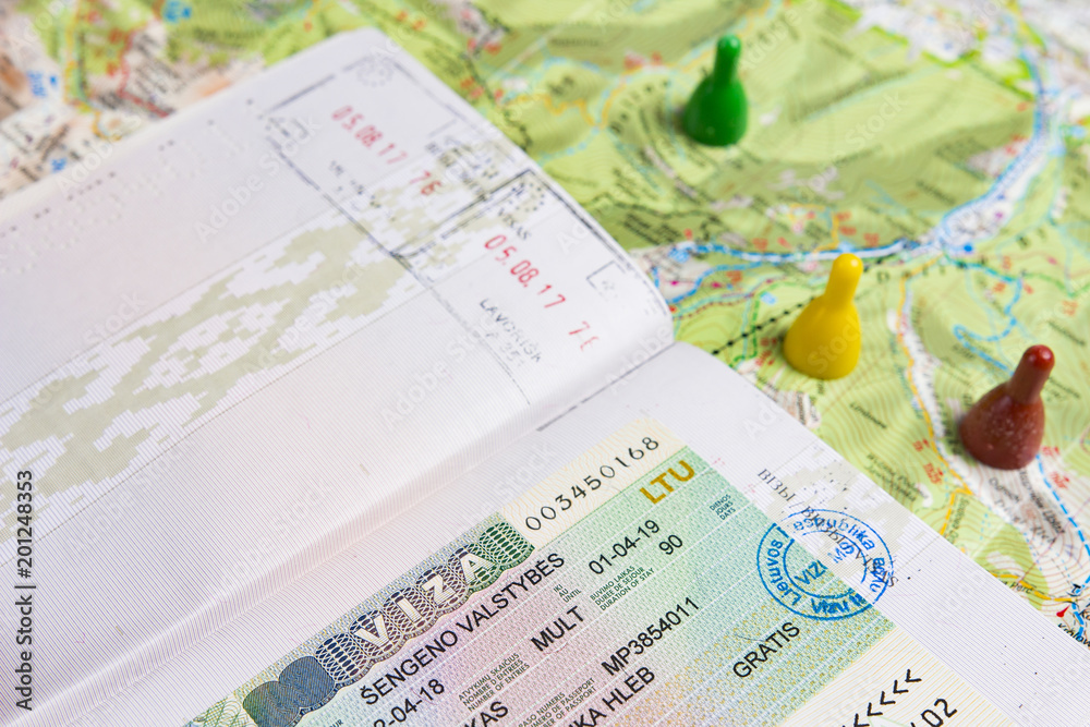 Minsk, Belarus - April 14, 2018: Schengen visa in passport and map of ...