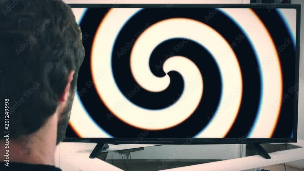 Vidéo Stock Hypnosis Television Hypnotic Tv. Young man hypnotized by ...