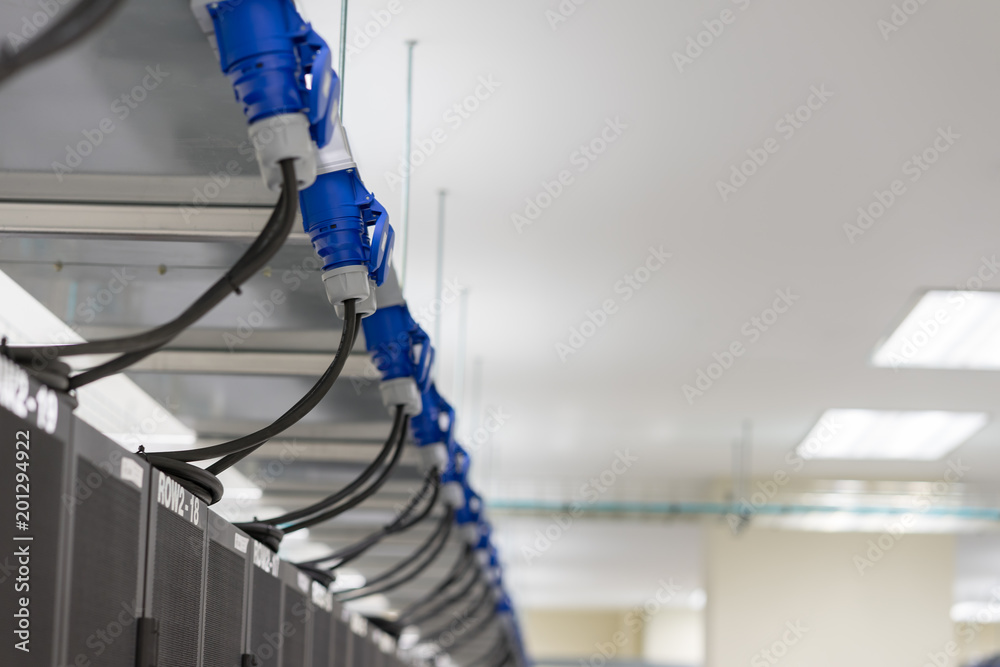 Blue emergency power plug, server room and black rack Stock Photo ...