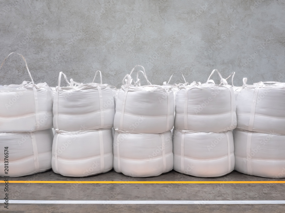 Stacking of bulk cargo in jumbo bags are store in warehouse. Stock ...