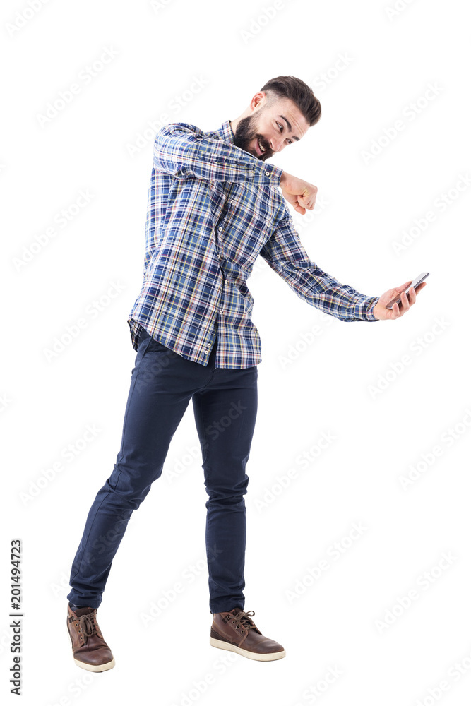 Angry bearded modern business man punching mobile phone screen. Rage ...