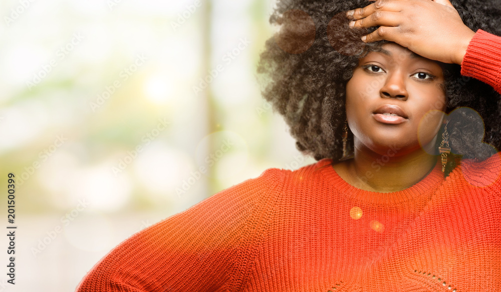 Beautiful african woman terrified and nervous expressing anxiety and ...