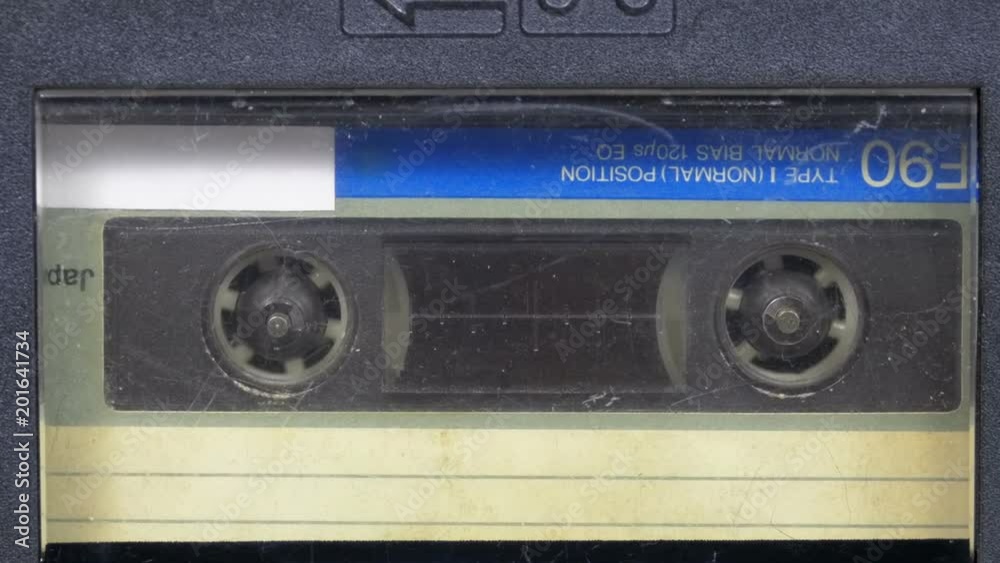 The Vintage Audio Cassette in the Tape Recorder Rotates. Macro static ...