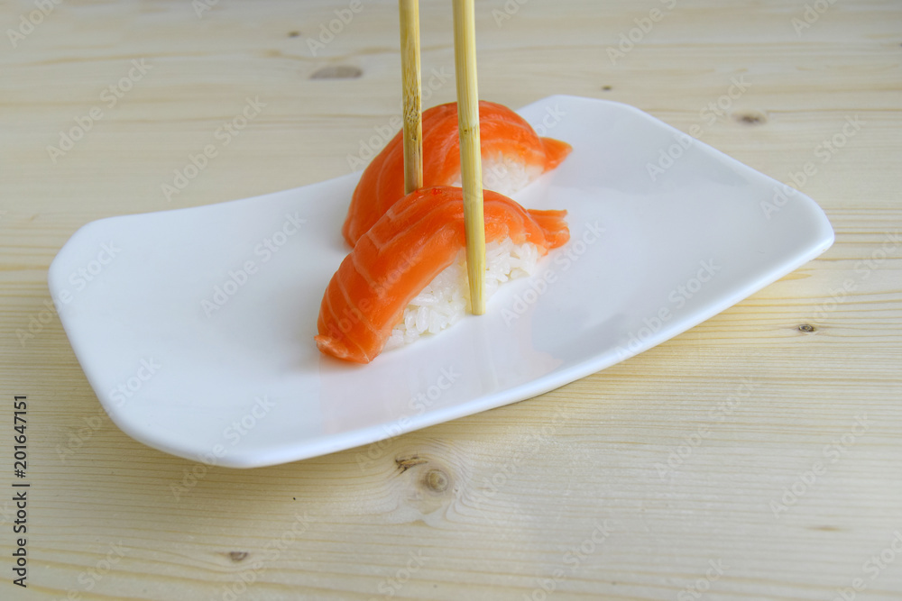 Sushi, nigiri, sake a dish of the traditional Japanese cuisine cooked ...