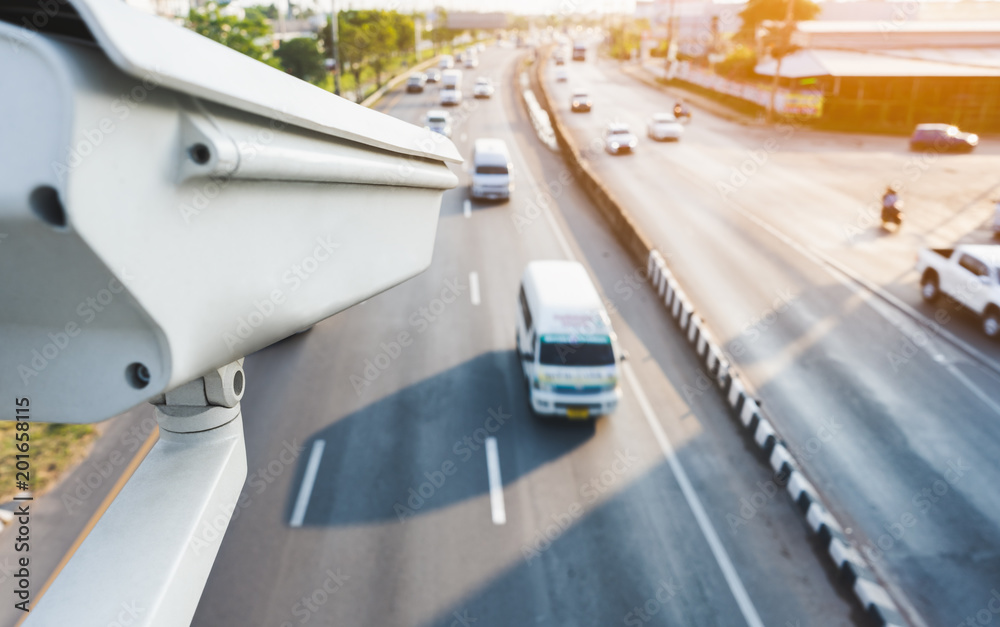 Security CCTV camera recording events of the cars on road Stock Photo ...