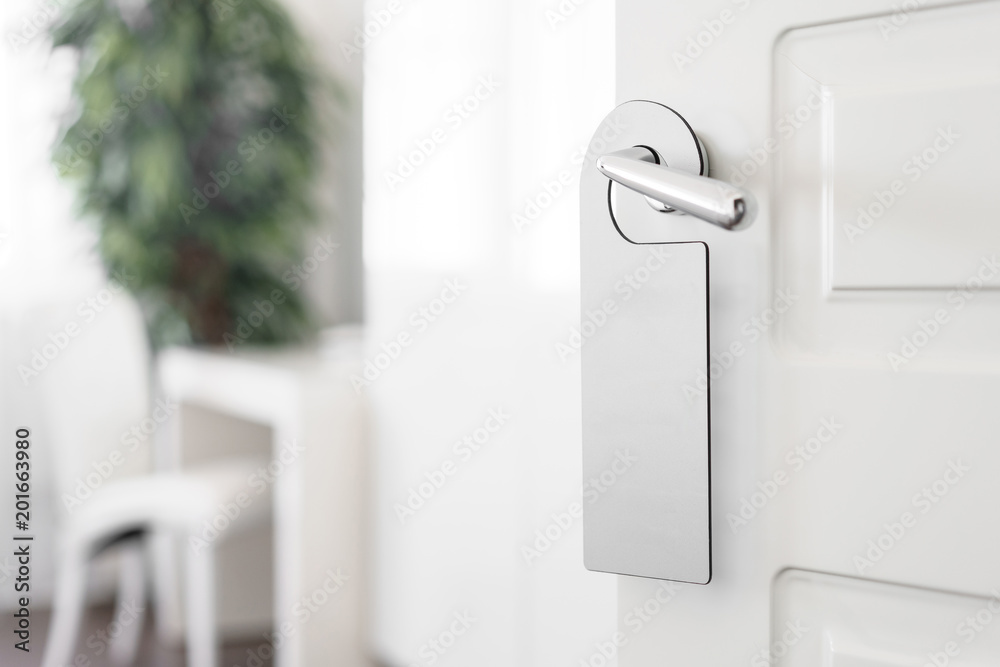 Door knob with empty label on a door handle for your text. Empty white ...