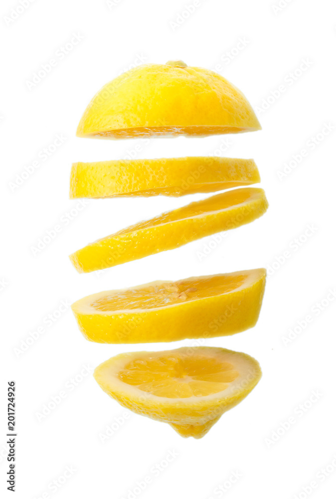 Flying lemon. Sliced lemon isolated on white background. Levity fruit ...