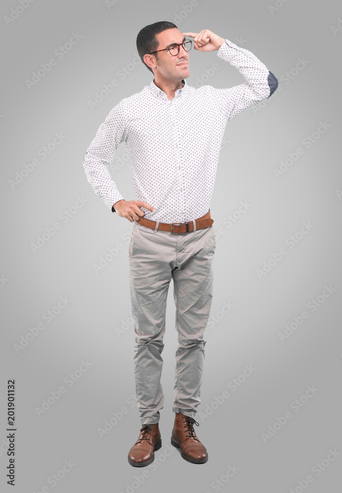 Puzzled young man with a gesture of confusion - Full body shot Stock ...