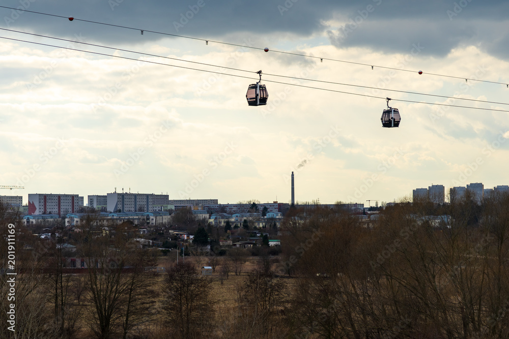 Wagons of a cable car over the natural landscape. Stock Photo | Adobe Stock