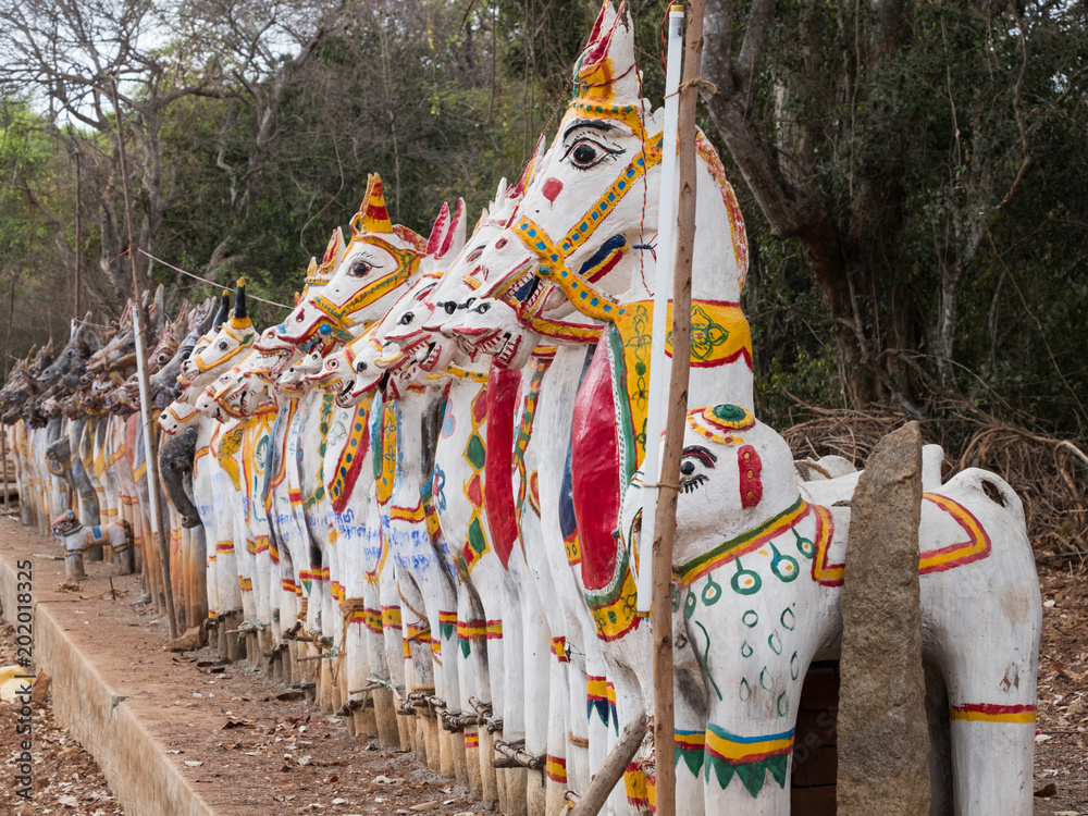 Clay horses assembled in homage to the god Ayyanar at Pallathur in ...