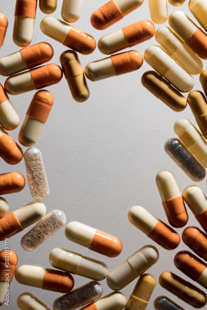 Pills and tablets forming a page border Stock Photo | Adobe Stock