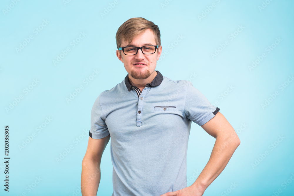 Arrogant bold self important stuck up man over blue background Stock ...