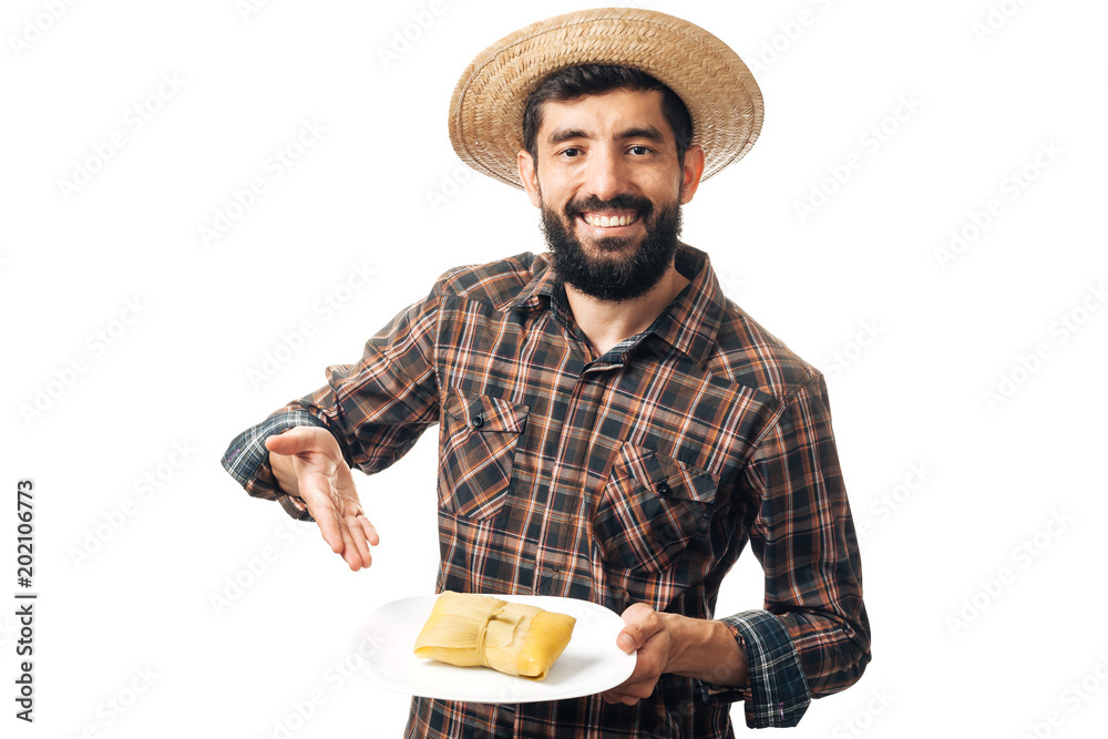 Brazilian man wearing typical clothes for the Festa Junina serving ...