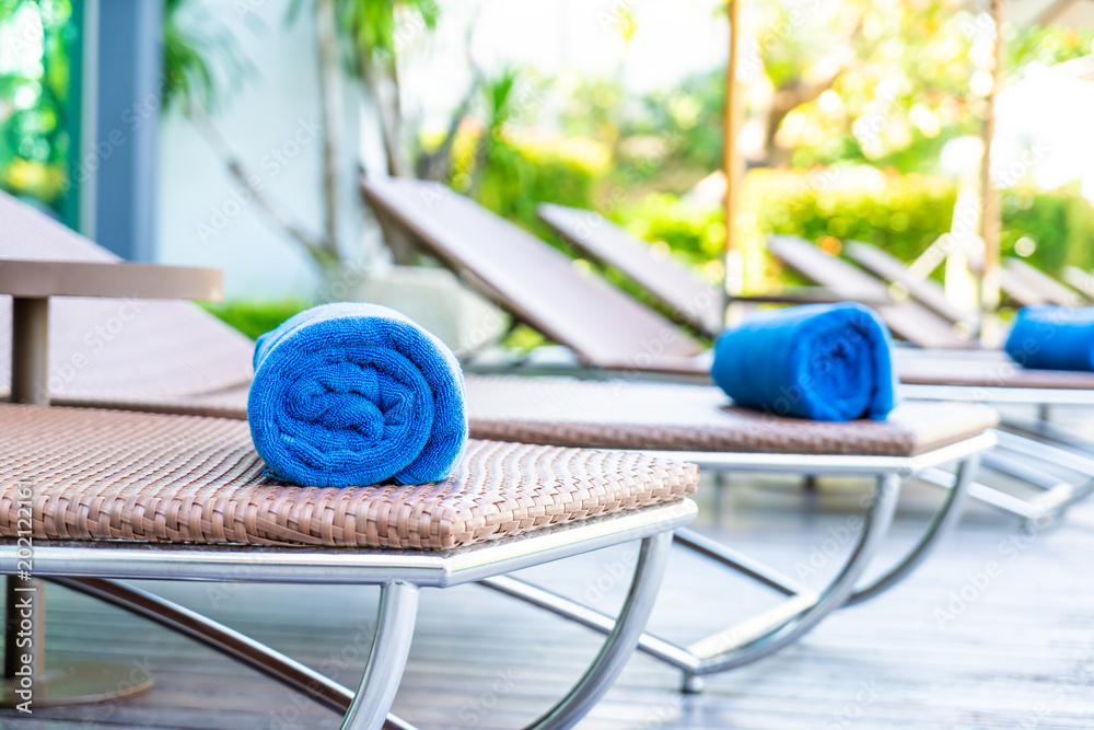 towel pool on bed around swimming pool in hotel resort Stock Photo ...