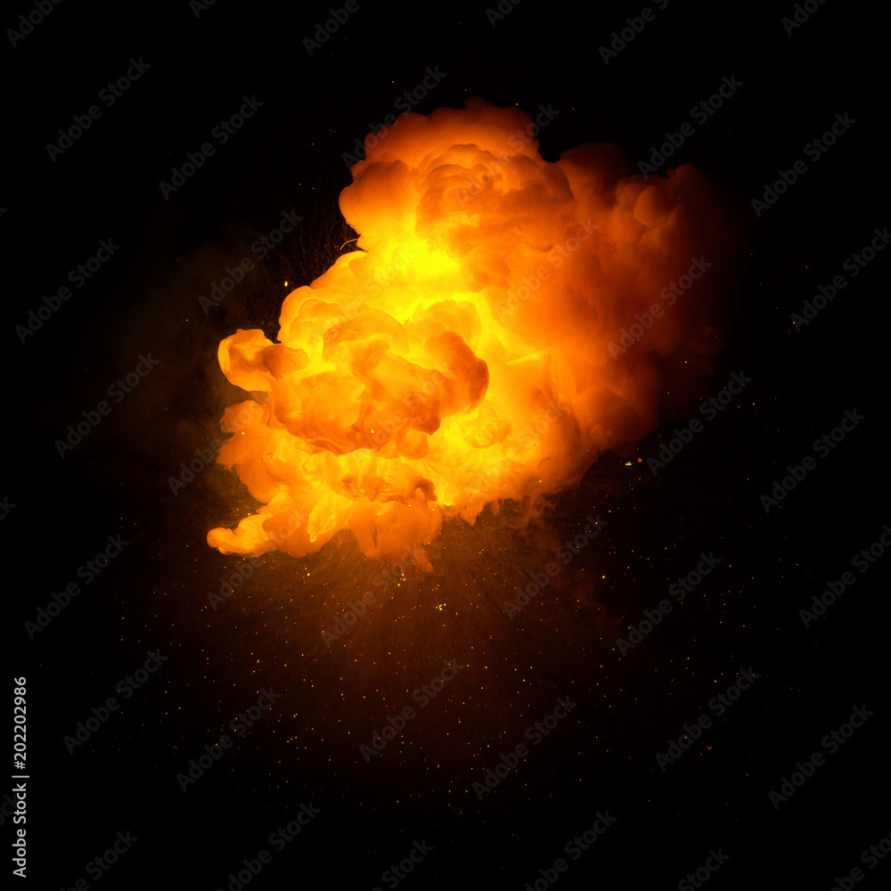 Realistic fiery explosion with sparks over a black background Stock ...