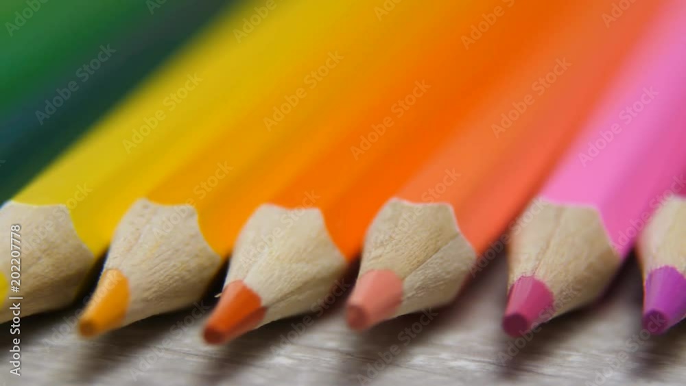 colored pencils laid out in the colors of the rainbow Stock Video ...