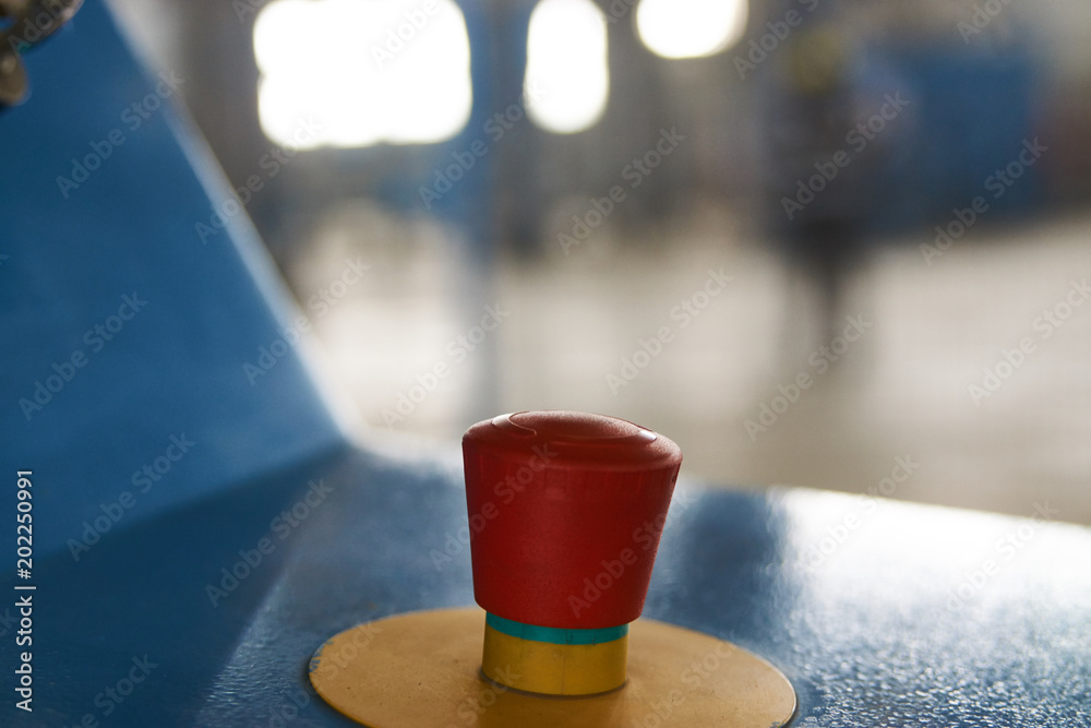 Close-up of a red emergency stop button in factory control room Stock ...