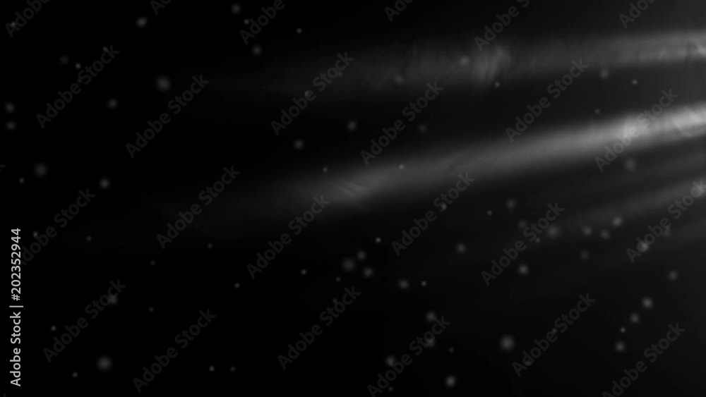 Floating dust particles in a beam of light (Loop). Stock 비디오 | Adobe Stock