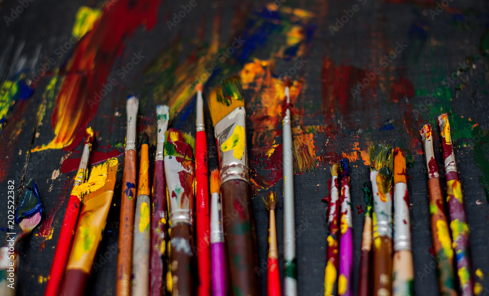 Artist paint brushes background. Stock Photo | Adobe Stock