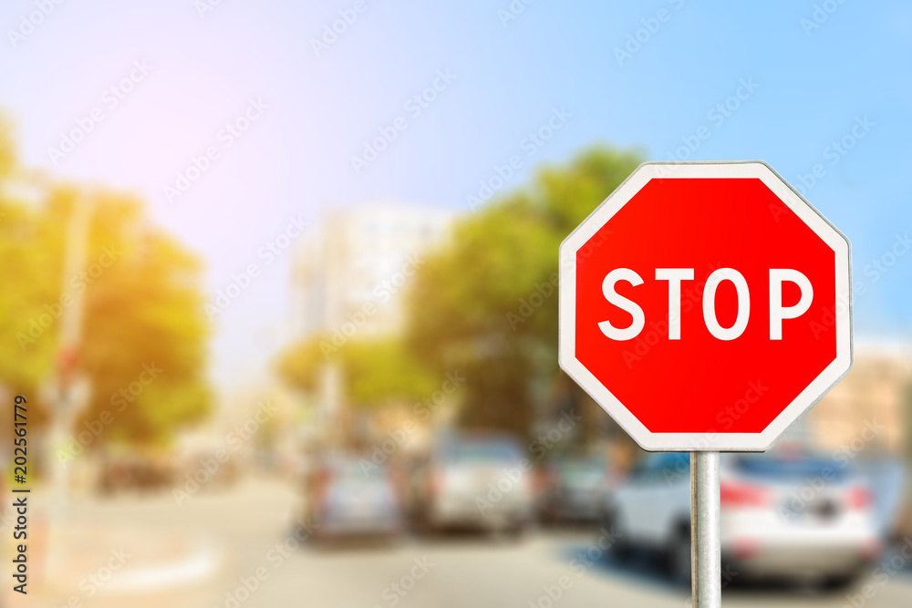 Stop sign by the City road with light effect Stock Photo | Adobe Stock