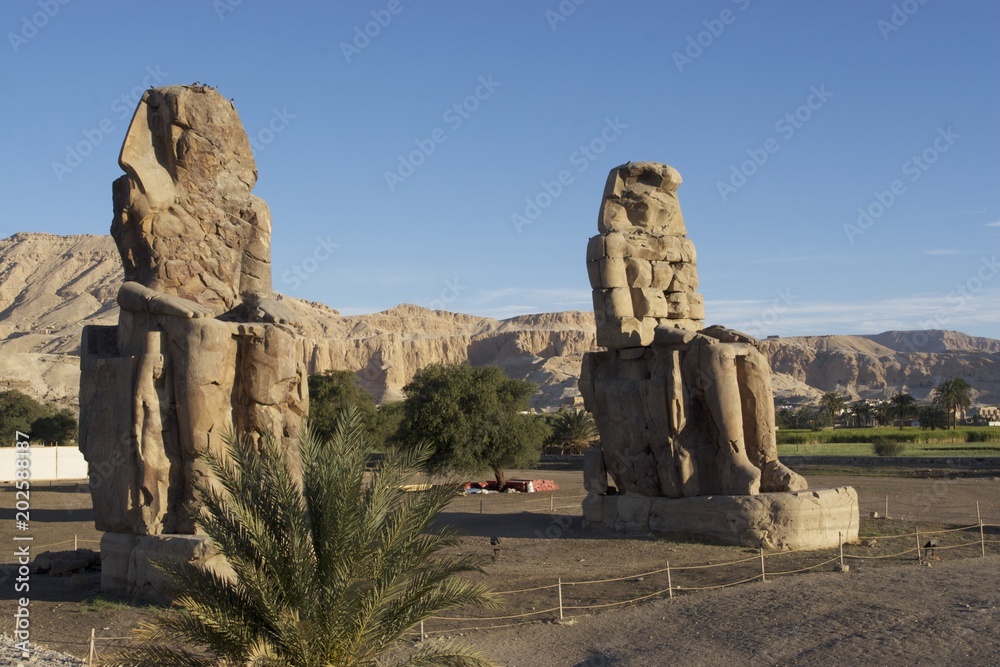 Statues of Pharaoh Amenhotep, Colossus of Memnon in the Western Teams ...